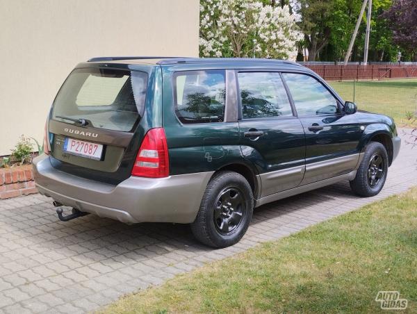 Green Subaru Forester 2004 in Silute, with an engine capacity of 2.00 L and mileage of 264 thousand km for 3350 €, photo 2 on AUTOMOTO.COM.LV