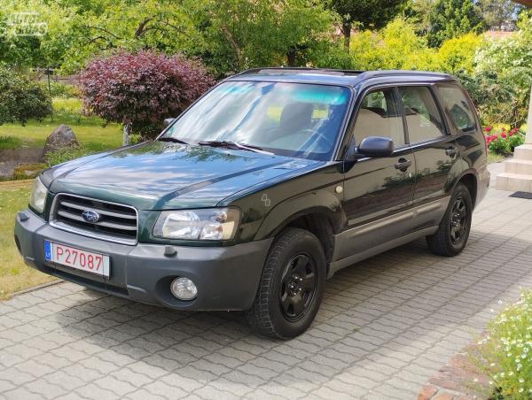 Green Subaru Forester 2004 in Silute, with an engine capacity of 2.00 L and mileage of 264 thousand km for 3350 €, photo 3 on AUTOMOTO.COM.LV