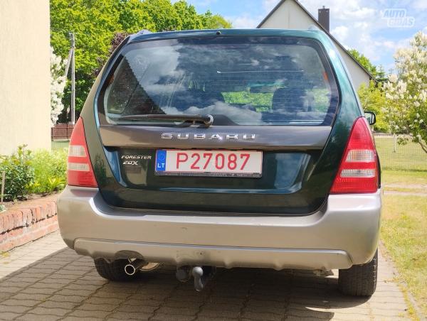 Green Subaru Forester 2004 in Silute, with an engine capacity of 2.00 L and mileage of 264 thousand km for 3350 €, photo 6 on AUTOMOTO.COM.LV