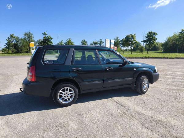 Green Subaru Forester 2004 in Panevezys, with an engine capacity of 1.99 L and mileage of 250 thousand km for 2800 €, photo 7 on AUTOMOTO.COM.LV