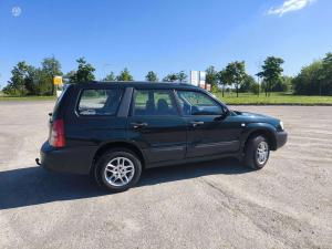 Green Subaru Forester 2004 in Panevezys, with an engine capacity of 1.99 L and mileage of 250 thousand km for 2800 €, photo 8 on AUTOMOTO.COM.LV