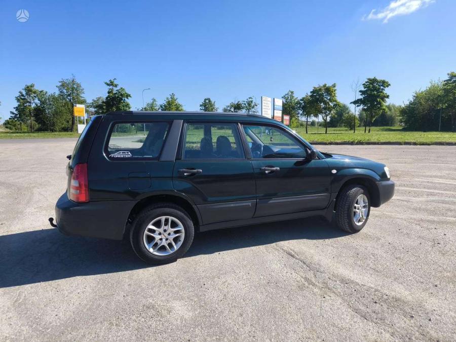 Green Subaru Forester 2004 in Panevezys, with an engine capacity of 1.99 L and mileage of 250 thousand km for 2800 €, photo 8 on AUTOMOTO.COM.LV
