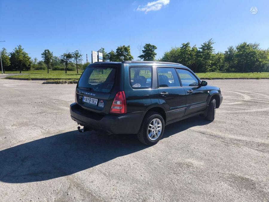 Green Subaru Forester 2004 in Panevezys, with an engine capacity of 1.99 L and mileage of 250 thousand km for 2800 €, photo 9 on AUTOMOTO.COM.LV
