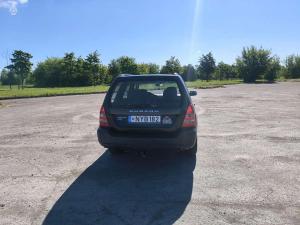 Green Subaru Forester 2004 in Panevezys, with an engine capacity of 1.99 L and mileage of 250 thousand km for 2800 €, photo 10 on AUTOMOTO.COM.LV