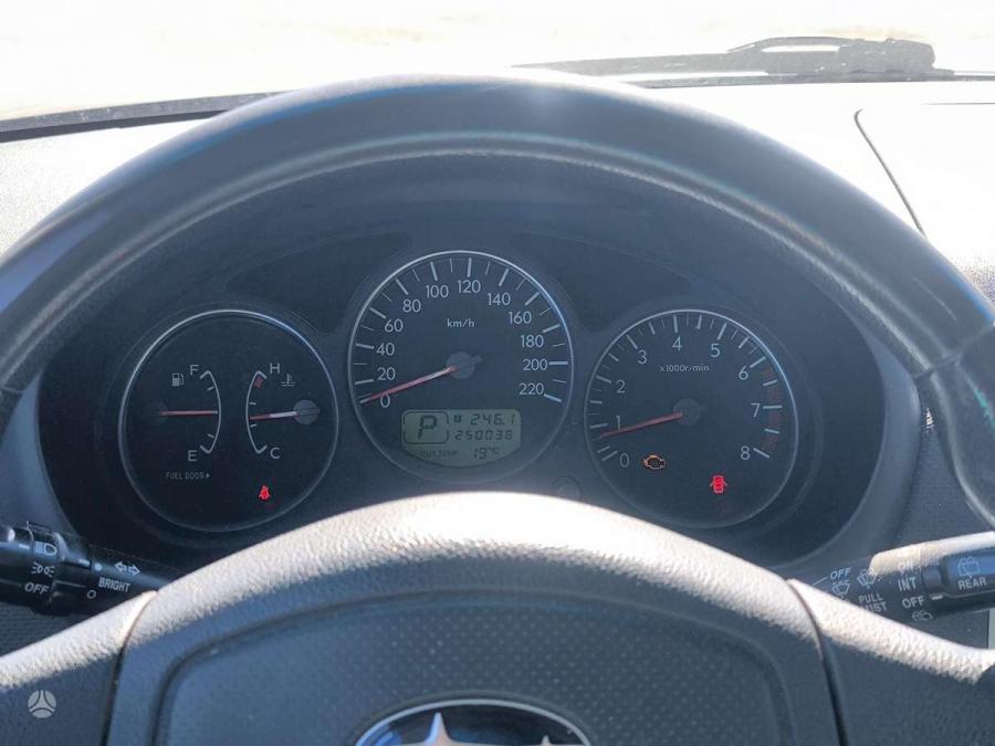Green Subaru Forester 2004 in Panevezys, with an engine capacity of 1.99 L and mileage of 250 thousand km for 2800 €, photo 14 on AUTOMOTO.COM.LV