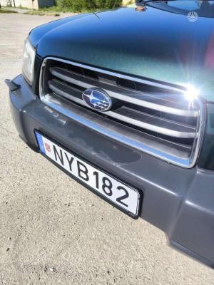 Green Subaru Forester 2004 in Panevezys, with an engine capacity of 1.99 L and mileage of 250 thousand km for 2800 €, photo 23 on AUTOMOTO.COM.LV