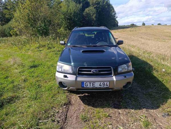 Subaru Forester 2004 in Vilnius on AUTOMOTO.COM.LV Green Subaru Forester 2004 in Vilnius, with an engine capacity of 2.00 L and mileage of 230 thousand km for 2700 €, photo 1 on AUTOMOTO.COM.LV