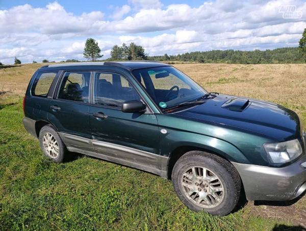 Subaru Forester 2004 in Vilnius on AUTOMOTO.COM.LV Green Subaru Forester 2004 in Vilnius, with an engine capacity of 2.00 L and mileage of 230 thousand km for 2700 €, photo 4 on AUTOMOTO.COM.LV