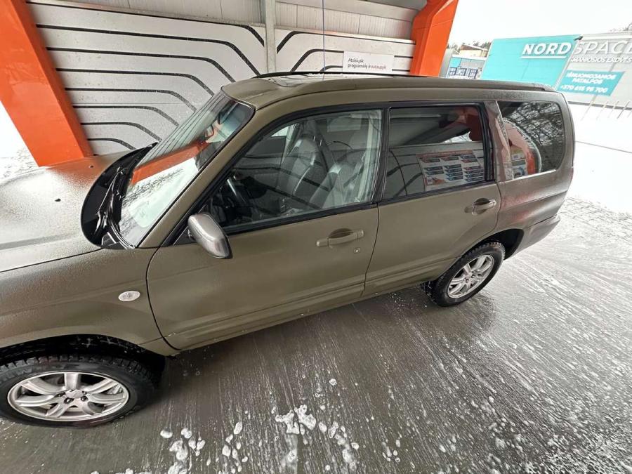 Green Subaru Forester 2005 in Vilnius, with an engine capacity of 2.00 L and mileage of 287 thousand km for 5900 €, photo 8 on AUTOMOTO.COM.LV