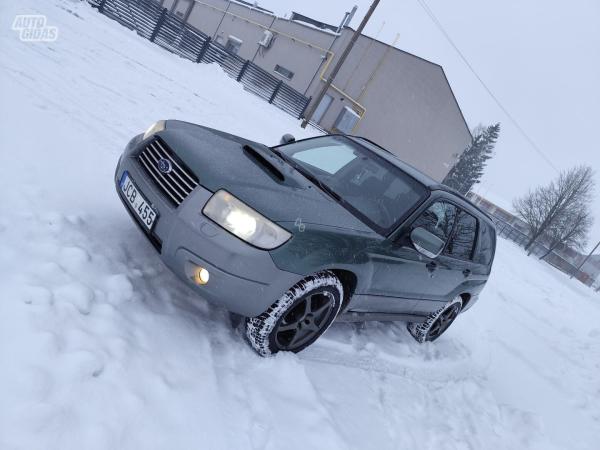 Green Subaru Forester 2006 in Vilnius, with an engine capacity of 2.50 L and mileage of 340 thousand km for 4300 €, photo 4 on AUTOMOTO.COM.LV