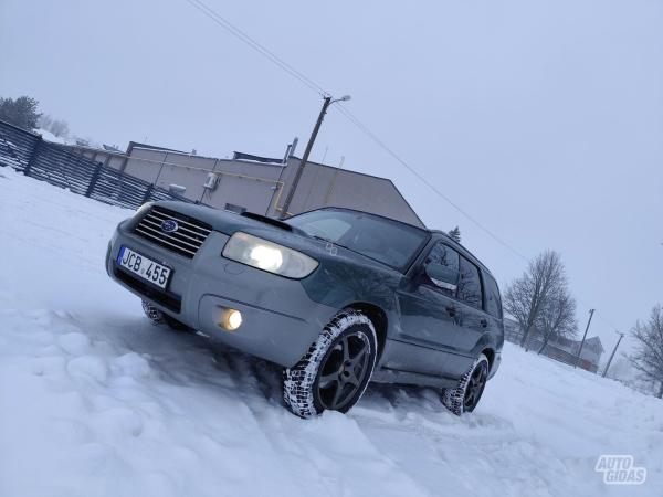 Green Subaru Forester 2006 in Vilnius, with an engine capacity of 2.50 L and mileage of 340 thousand km for 4300 €, photo 6 on AUTOMOTO.COM.LV