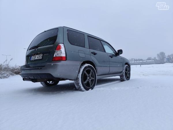 Green Subaru Forester 2006 in Vilnius, with an engine capacity of 2.50 L and mileage of 340 thousand km for 4300 €, photo 9 on AUTOMOTO.COM.LV