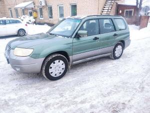 Green Subaru Forester 2006 in Utena, with an engine capacity of 1.99 L and mileage of 265 thousand km for 2750 €, photo 12 on AUTOMOTO.COM.LV