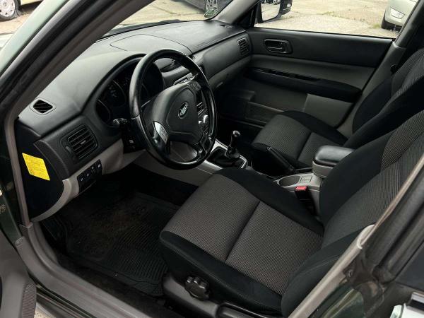 Green Subaru Forester 2006 in Utena, with an engine capacity of 1.99 L and mileage of 199 thousand km for 3650 €, photo 8 on AUTOMOTO.COM.LV