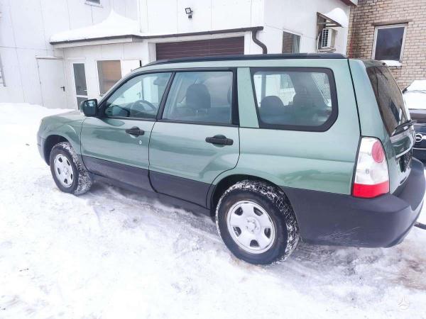 Green Subaru Forester 2007 in Utena, with an engine capacity of 1.99 L and mileage of 188 thousand km for 3450 €, photo 10 on AUTOMOTO.COM.LV