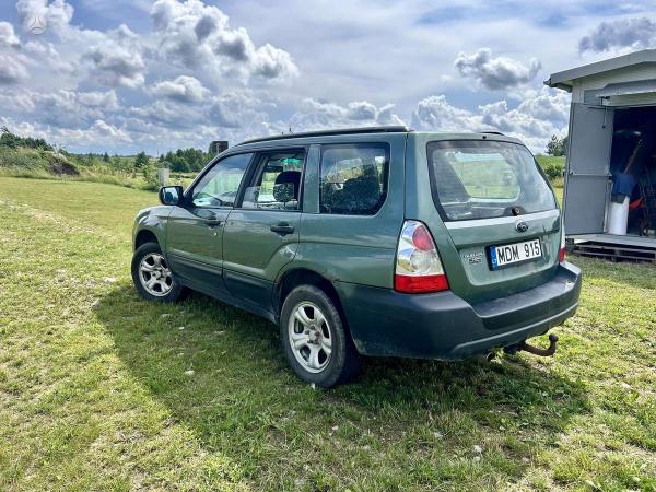 Green Subaru Forester 2007 in Vilnius, with an engine capacity of 2.00 L and mileage of 397 thousand km for 2000 €, photo 1 on AUTOMOTO.COM.LV