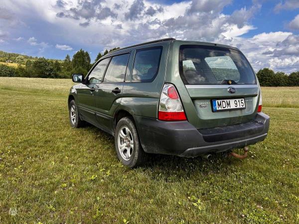 Green Subaru Forester 2007 in Vilnius, with an engine capacity of 2.00 L and mileage of 397 thousand km for 2000 €, photo 4 on AUTOMOTO.COM.LV