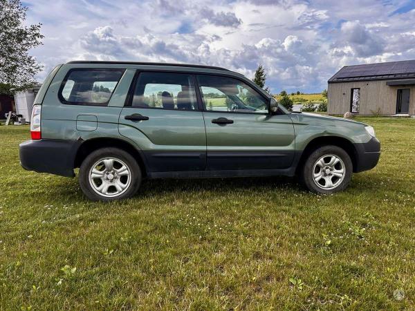 Green Subaru Forester 2007 in Vilnius, with an engine capacity of 2.00 L and mileage of 397 thousand km for 2000 €, photo 6 on AUTOMOTO.COM.LV