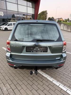 Green Subaru Forester 2009 in Utena, with an engine capacity of 1.99 L and mileage of 205 thousand km for 6500 €, photo 21 on AUTOMOTO.COM.LV