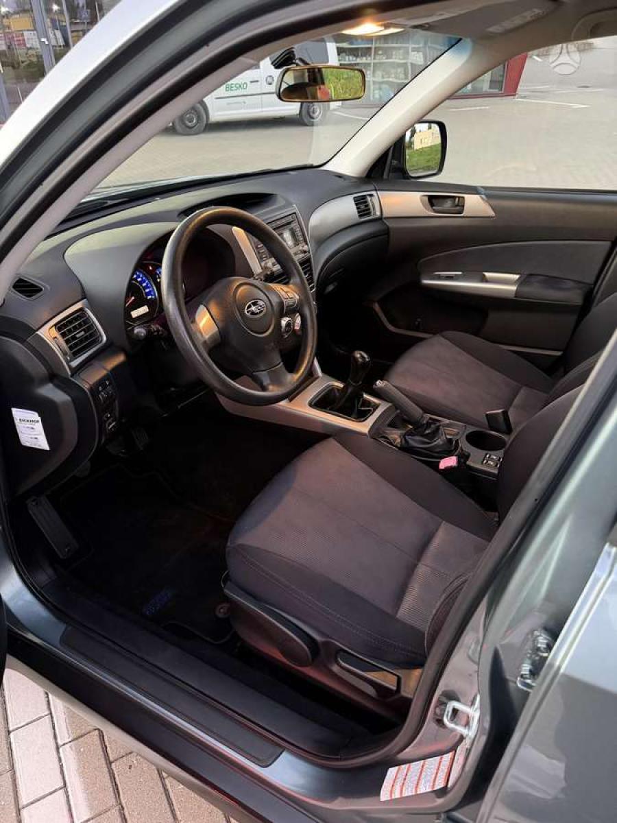 Green Subaru Forester 2009 in Utena, with an engine capacity of 1.99 L and mileage of 205 thousand km for 6500 €, photo 23 on AUTOMOTO.COM.LV
