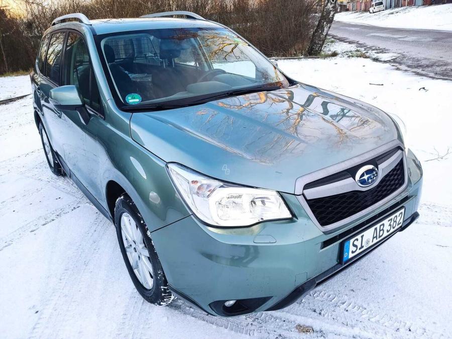 Green Subaru Forester 2016 in Utena, with an engine capacity of 2.00 L and mileage of 219 thousand km for 7700 €, photo 8 on AUTOMOTO.COM.LV