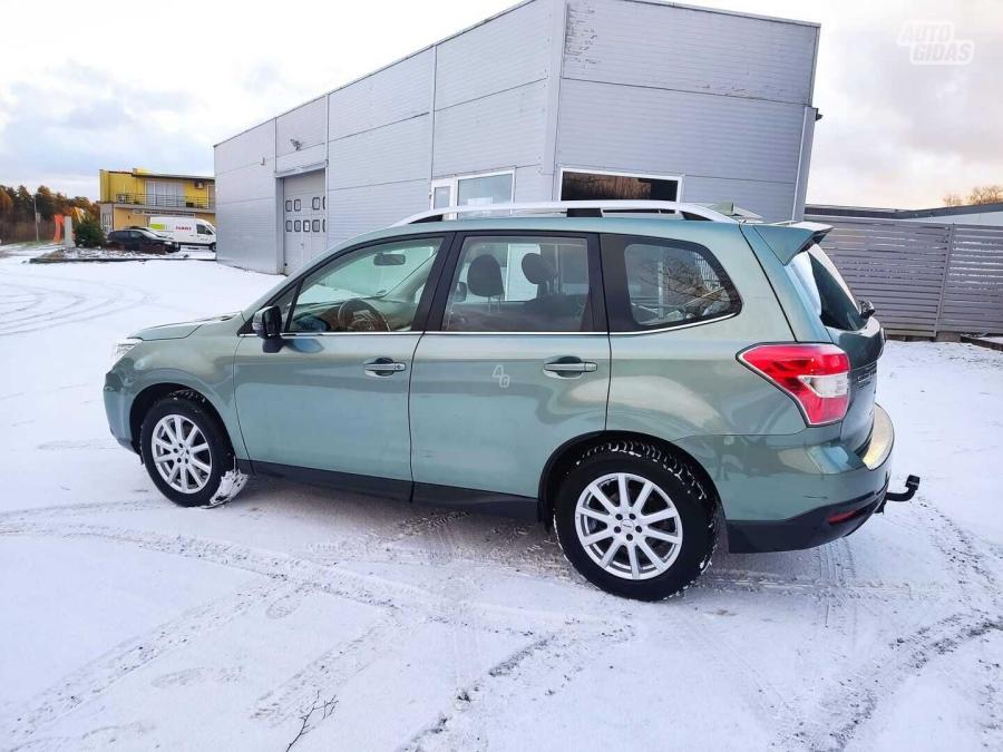 Green Subaru Forester 2016 in Utena, with an engine capacity of 2.00 L and mileage of 219 thousand km for 7700 €, photo 12 on AUTOMOTO.COM.LV