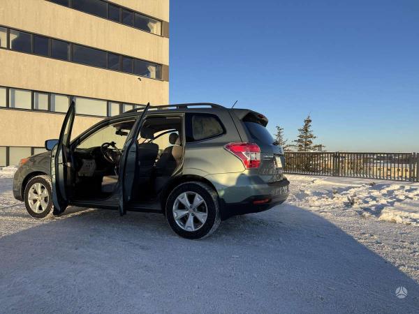 Green Subaru Forester 2015 in Vilnius, with an engine capacity of 2.50 L and mileage of 200 thousand km for 12509 €, photo 3 on AUTOMOTO.COM.LV