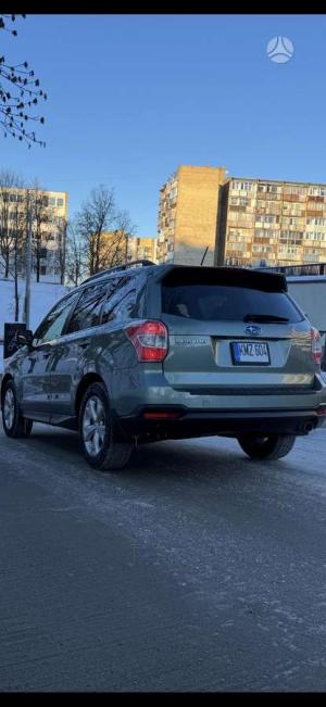 Green Subaru Forester 2015 in Vilnius, with an engine capacity of 2.50 L and mileage of 200 thousand km for 12509 €, photo 11 on AUTOMOTO.COM.LV