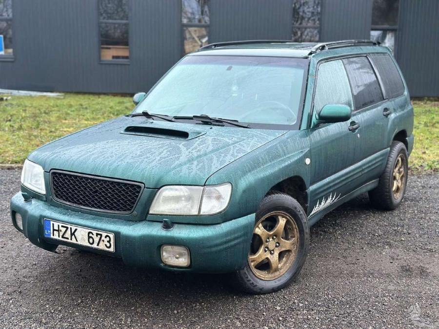 Zaļš Subaru Forester 2001 Viļņa, ar dzinēja tilpumu 2.00 L un nobraukumu 385 tūkst. km par 1800 €, foto 1 vietnē AUTOMOTO.COM.LV