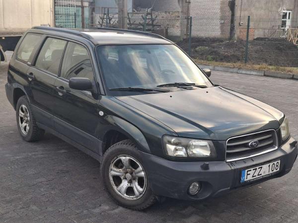 Green Subaru Forester 2004 in Silute, with an engine capacity of 2.00 L and mileage of 340 thousand km for 2350 €, photo 2 on AUTOMOTO.COM.LV
