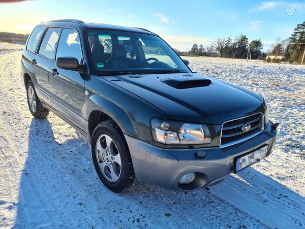 Green Subaru Forester 2004 in Taurage, with an engine capacity of 2.00 L and mileage of 216 thousand km for 3700 €, photo 1 on AUTOMOTO.COM.LV