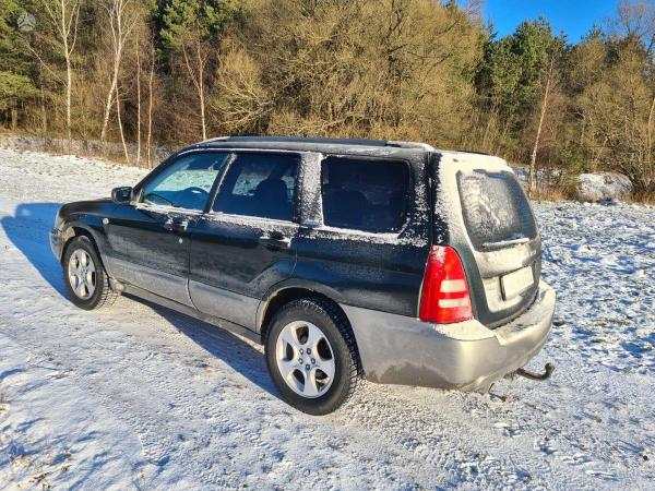 Green Subaru Forester 2004 in Taurage, with an engine capacity of 2.00 L and mileage of 216 thousand km for 3700 €, photo 2 on AUTOMOTO.COM.LV