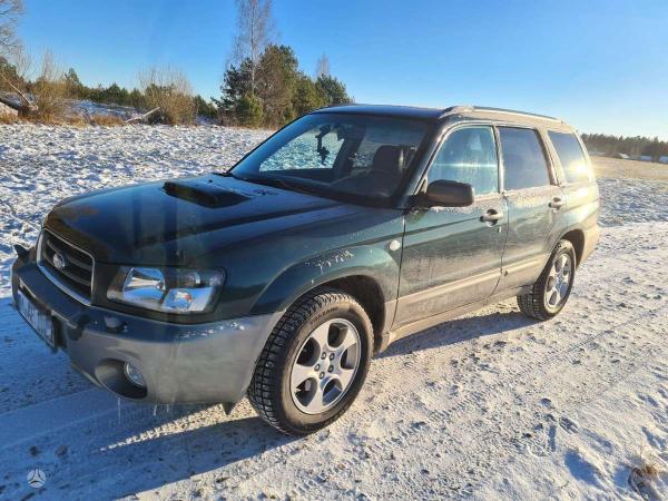 Green Subaru Forester 2004 in Taurage, with an engine capacity of 2.00 L and mileage of 216 thousand km for 3700 €, photo 8 on AUTOMOTO.COM.LV
