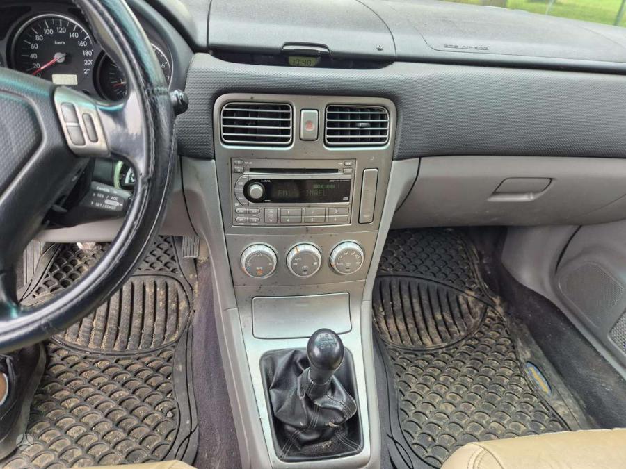Green Subaru Forester 2005 in Taurage, with an engine capacity of 2.00 L and mileage of 247 thousand km for 1900 €, photo 15 on AUTOMOTO.COM.LV