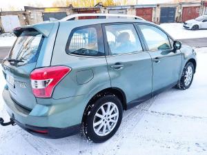 Green Subaru Forester 2016 in Utena, with an engine capacity of 2.00 L and mileage of 219 thousand km for 7900 €, photo 18 on AUTOMOTO.COM.LV