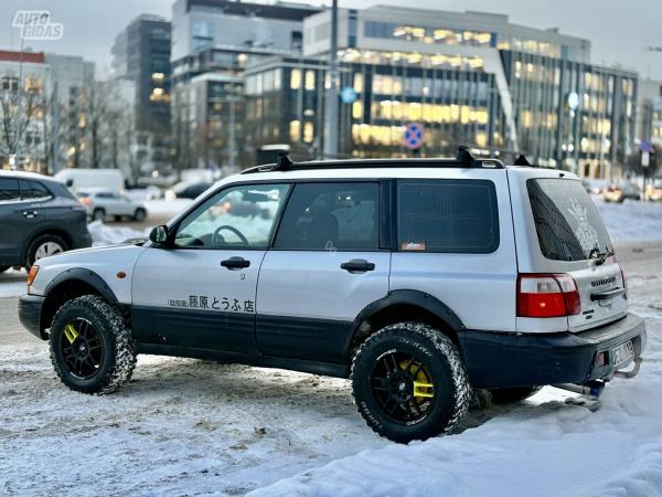 Pelēks Subaru Forester 2001 Viļņa, ar dzinēja tilpumu 2.00 L un nobraukumu 244 tūkst. km par 2550 €, foto 5 vietnē AUTOMOTO.COM.LV