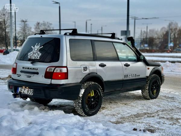 Pelēks Subaru Forester 2001 Viļņa, ar dzinēja tilpumu 2.00 L un nobraukumu 244 tūkst. km par 2550 €, foto 6 vietnē AUTOMOTO.COM.LV