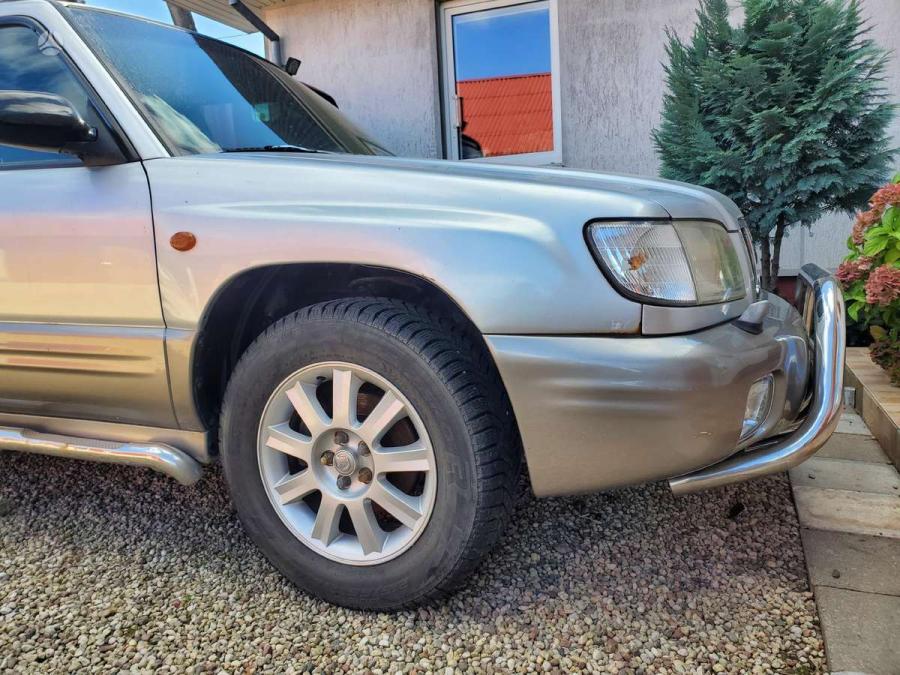 Grey Subaru Forester 2001 in Rokiskis, with an engine capacity of 1.99 L and mileage of 233 thousand km for 1750 €, photo 6 on AUTOMOTO.COM.LV