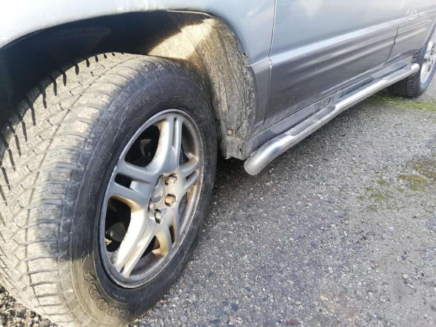 Grey Subaru Forester 2001 in Rokiskis, with an engine capacity of 1.99 L and mileage of 233 thousand km for 1750 €, photo 7 on AUTOMOTO.COM.LV