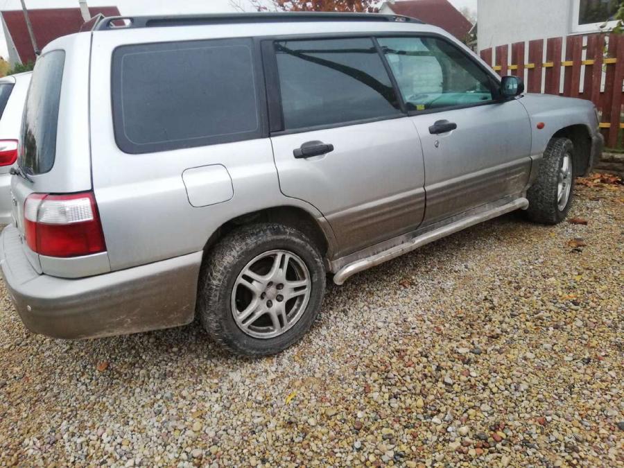 Grey Subaru Forester 2001 in Rokiskis, with an engine capacity of 1.99 L and mileage of 233 thousand km for 1750 €, photo 23 on AUTOMOTO.COM.LV