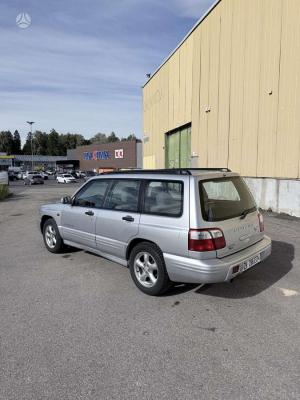 Pelēks Subaru Forester 2001 Viļņa, ar dzinēja tilpumu 2.00 L un nobraukumu 174 tūkst. km par 5150 €, foto 8 vietnē AUTOMOTO.COM.LV