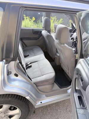 Pelēks Subaru Forester 2001 Viļņa, ar dzinēja tilpumu 2.00 L un nobraukumu 174 tūkst. km par 5150 €, foto 25 vietnē AUTOMOTO.COM.LV