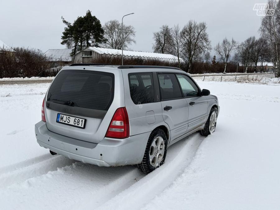 Pelēks Subaru Forester 2003 Tauragė, ar dzinēja tilpumu 2.00 L un nobraukumu 370 tūkst. km par 3250 €, foto 5 vietnē AUTOMOTO.COM.LV