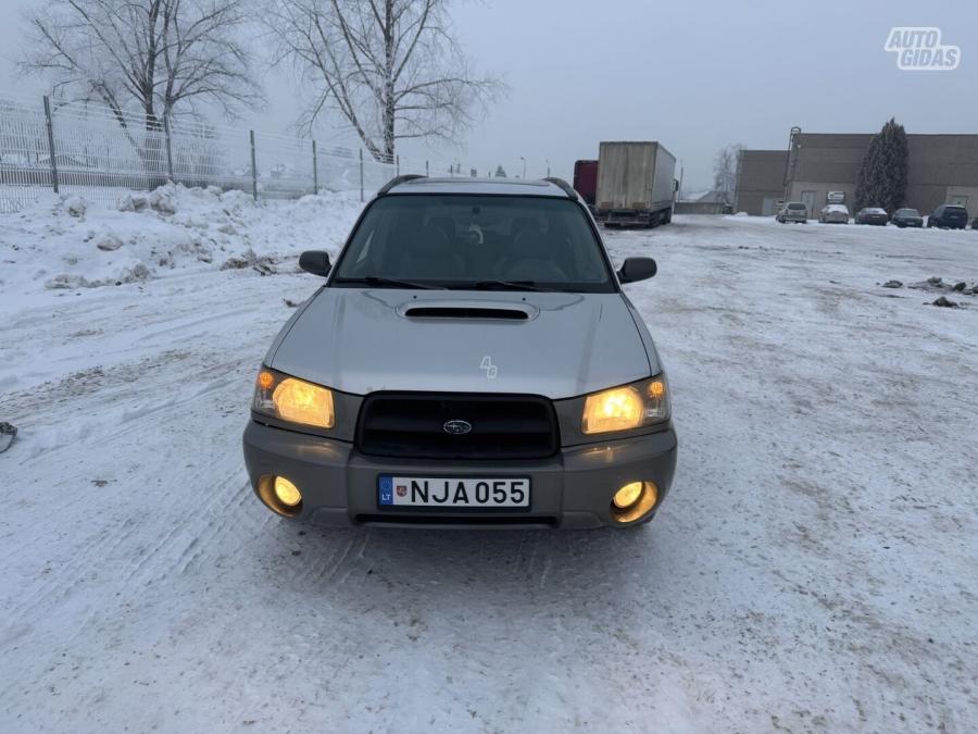 Pelēks Subaru Forester 2003 Šauļi, ar dzinēja tilpumu 2.00 L un nobraukumu 325 tūkst. km par 3550 €, foto 1 vietnē AUTOMOTO.COM.LV