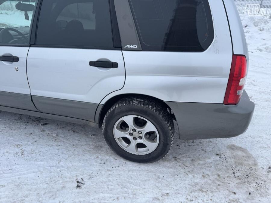 Pelēks Subaru Forester 2003 Šauļi, ar dzinēja tilpumu 2.00 L un nobraukumu 325 tūkst. km par 3550 €, foto 7 vietnē AUTOMOTO.COM.LV