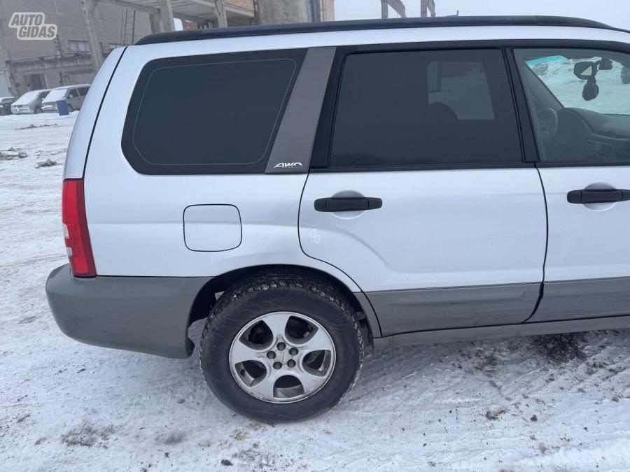 Pelēks Subaru Forester 2003 Šauļi, ar dzinēja tilpumu 2.00 L un nobraukumu 325 tūkst. km par 3550 €, foto 8 vietnē AUTOMOTO.COM.LV
