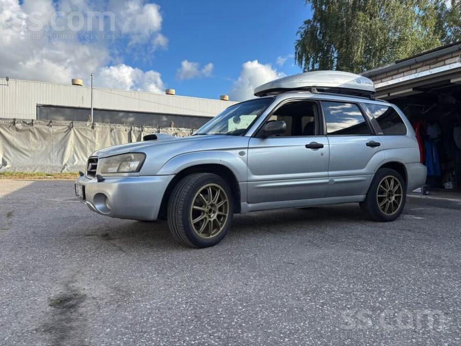 Grey Subaru Forester 2003 in Riga, with an engine capacity of 2.00 L and mileage of 278 thousand km for 3300 €, photo 1 on AUTOMOTO.COM.LV