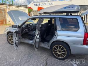 Grey Subaru Forester 2003 in Riga, with an engine capacity of 2.00 L and mileage of 278 thousand km for 3300 €, photo 5 on AUTOMOTO.COM.LV