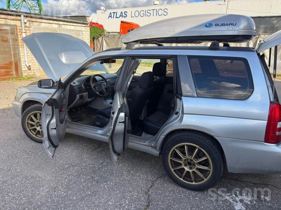 Grey Subaru Forester 2003 in Riga, with an engine capacity of 2.00 L and mileage of 278 thousand km for 3300 €, photo 5 on AUTOMOTO.COM.LV