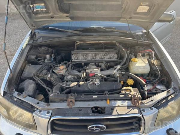 Pelēks Subaru Forester 2003 Rīga, ar dzinēja tilpumu 2.00 L un nobraukumu 278 tūkst. km par 3300 €, foto 6 vietnē AUTOMOTO.COM.LV